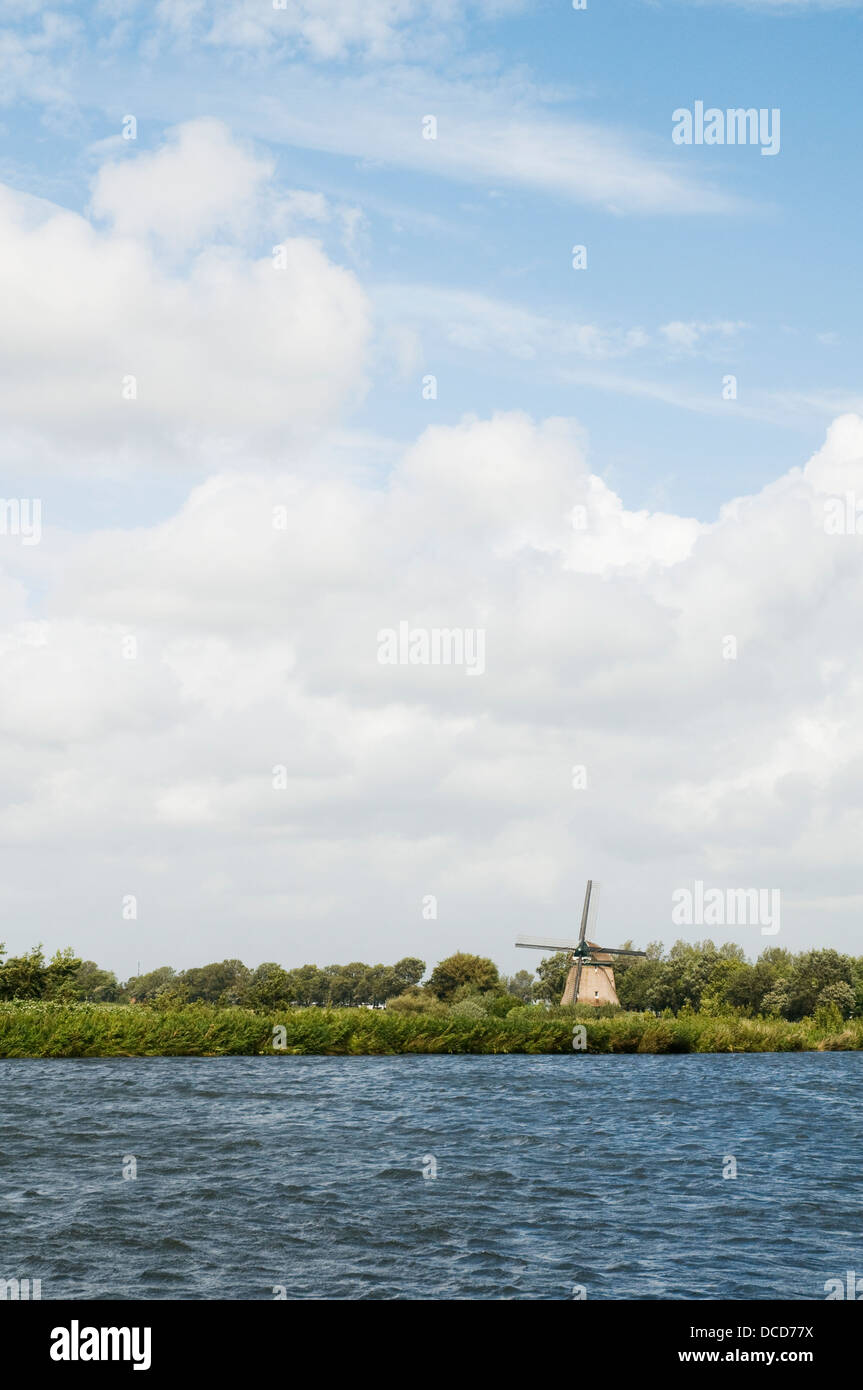 Windmill in landscape Stock Photo - Alamy