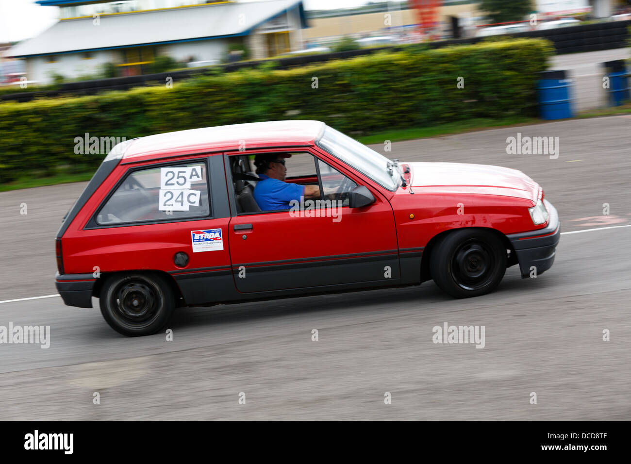 A car taking part in an AutoSolo at Castle Combe Circuit Stock Photo ...