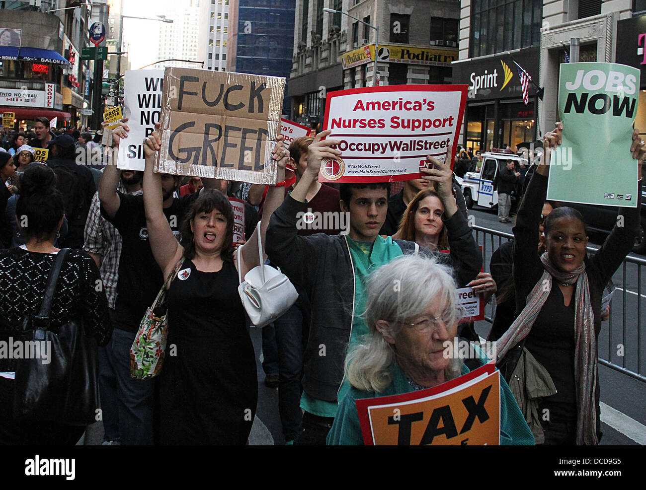 Occupy Wall Street protesters hold a rally in Manhattan. A crowd of ...