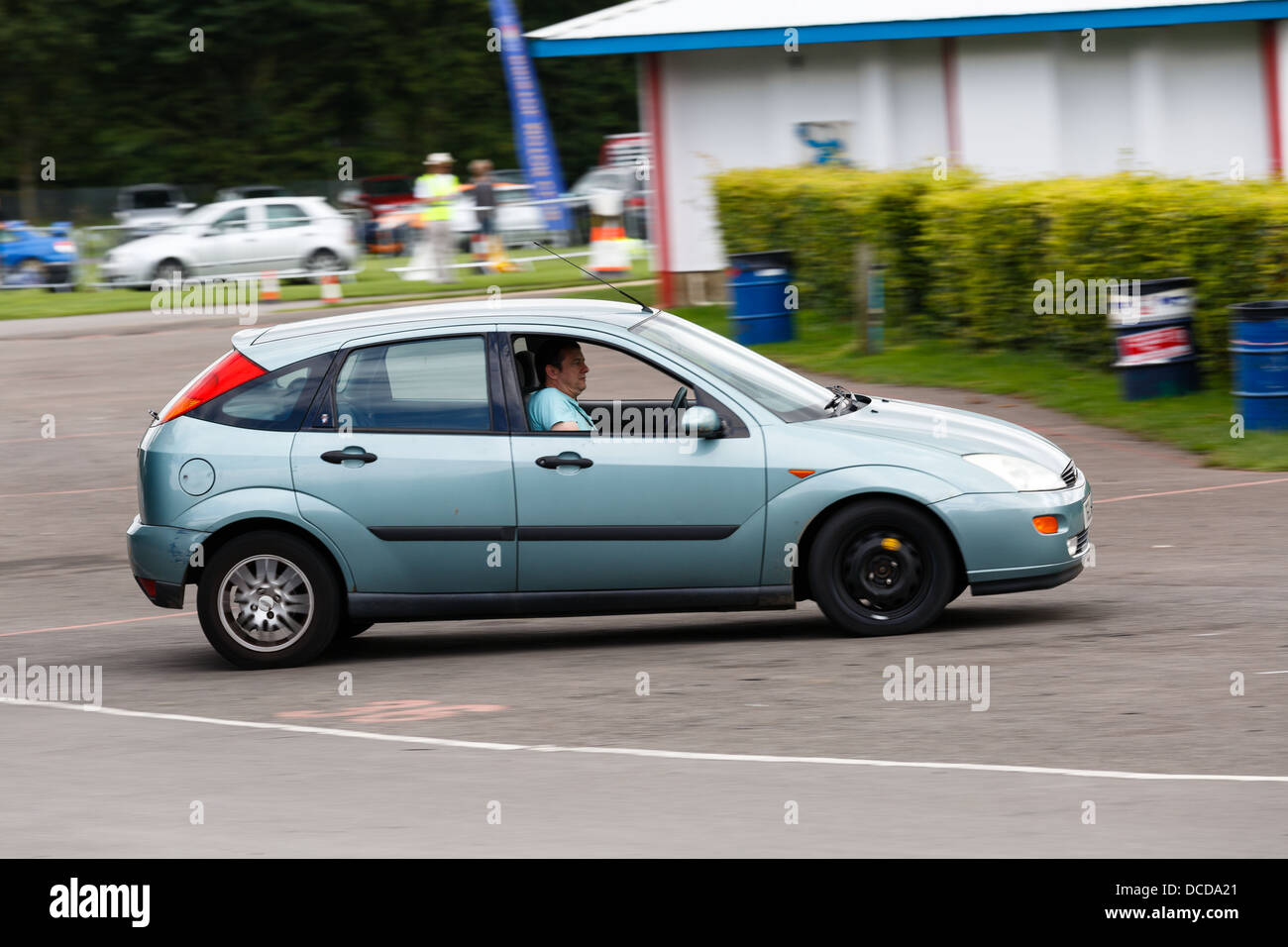 A car taking part in an AutoSolo at Castle Combe Circuit Stock Photo ...