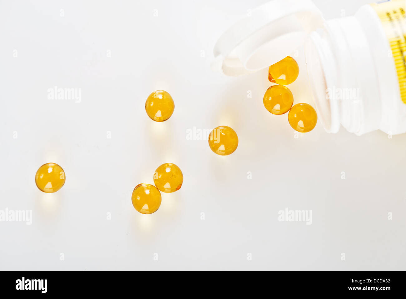 Spilled fish oil capsules hi-res stock photography and images - Alamy