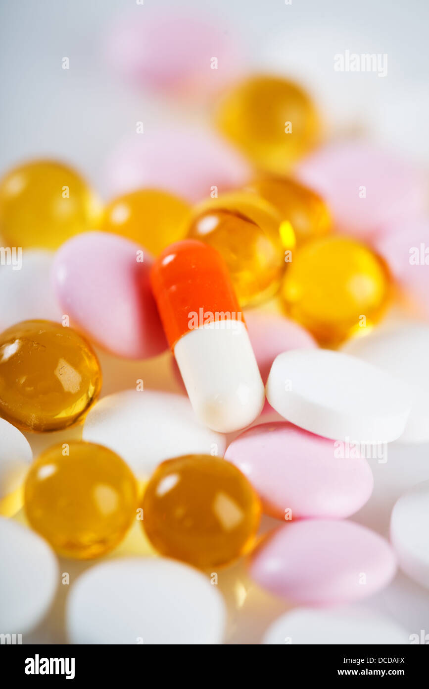 Colorful tablets with capsules Stock Photo - Alamy