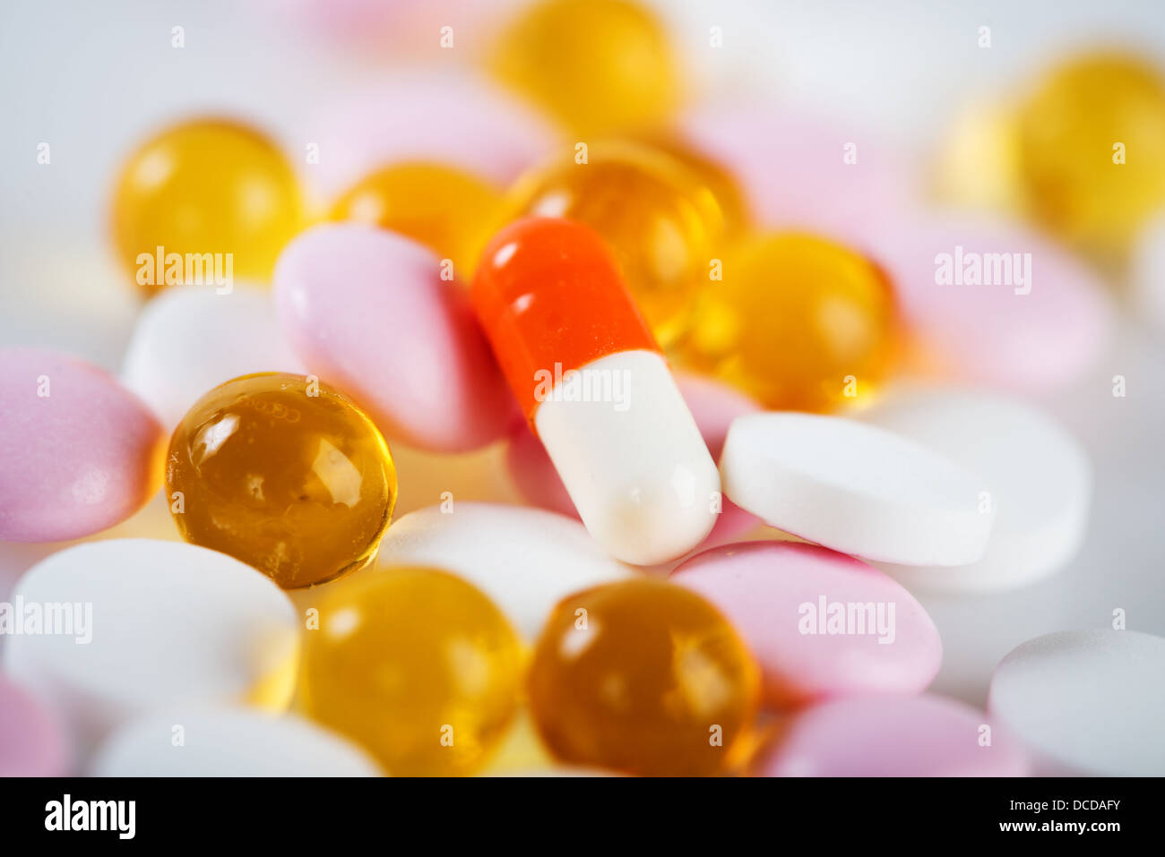 Colorful tablets with capsules Stock Photo - Alamy
