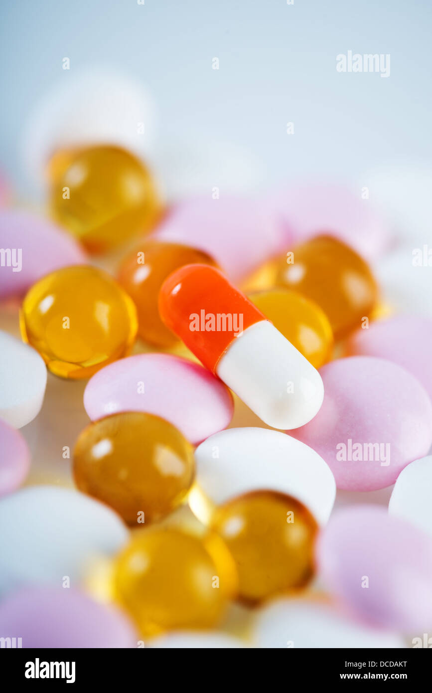 Colorful tablets with capsules Stock Photo - Alamy