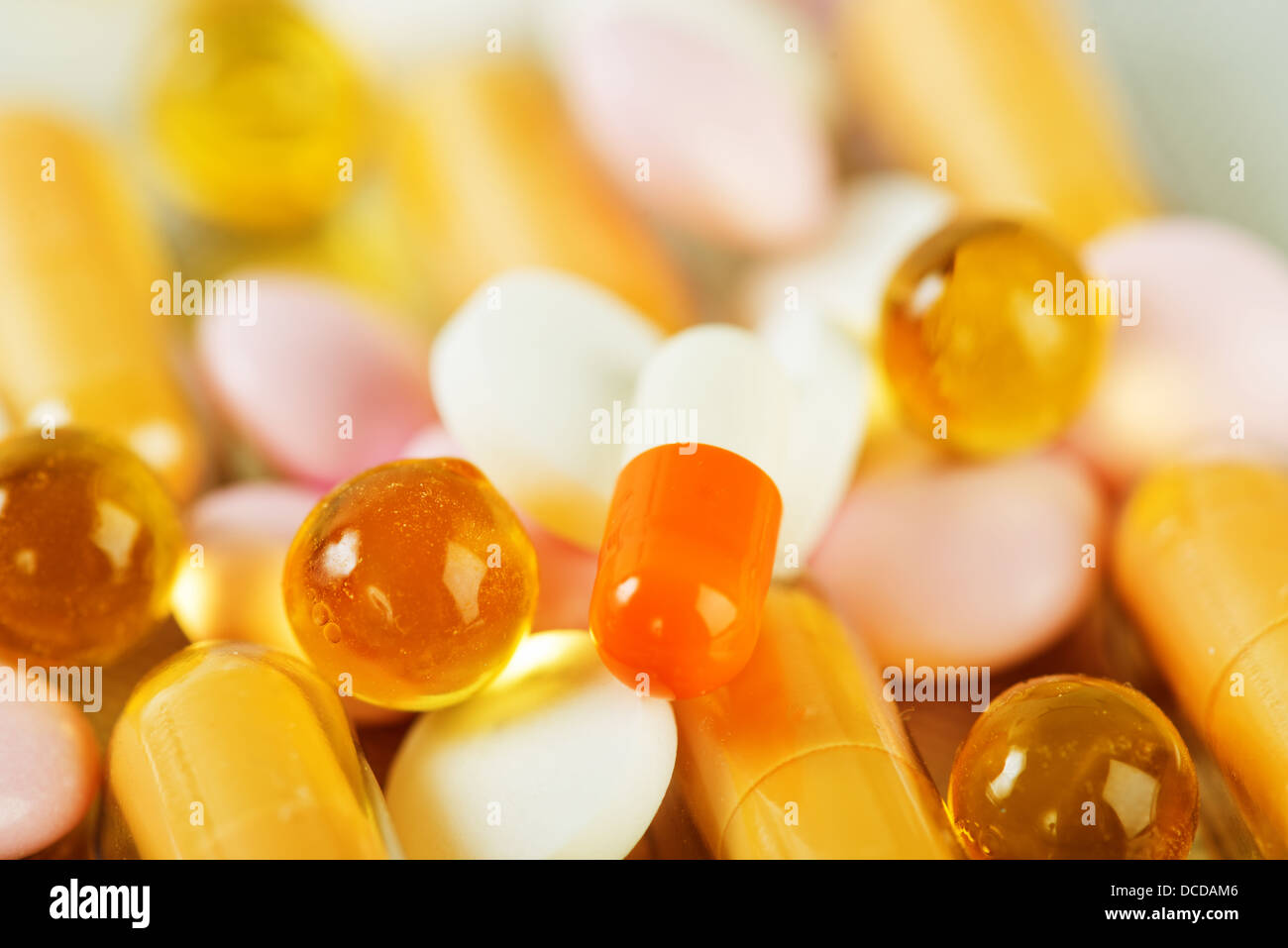 Colorful tablets with capsules Stock Photo - Alamy