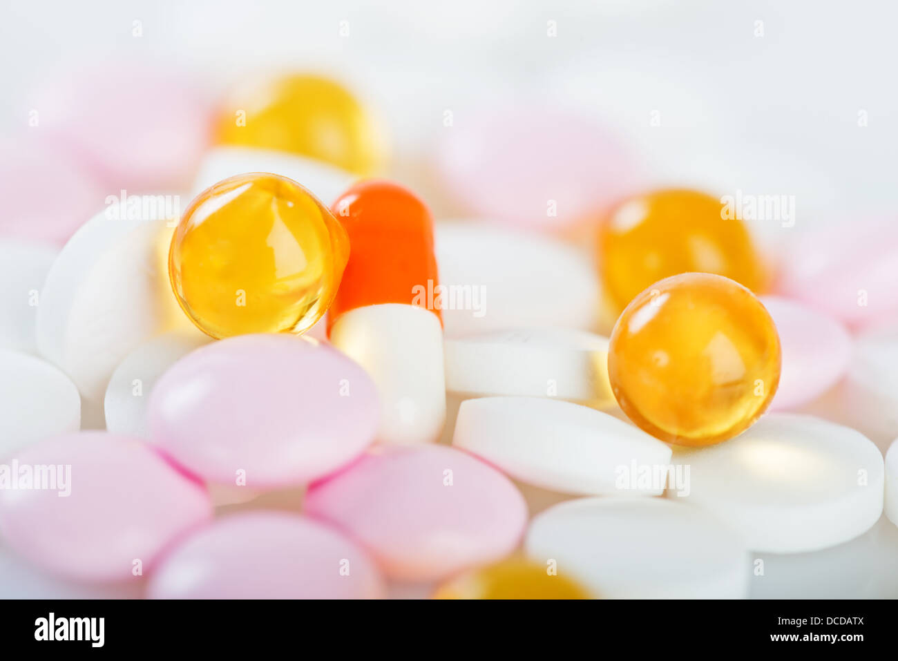 Colorful tablets with capsules Stock Photo - Alamy