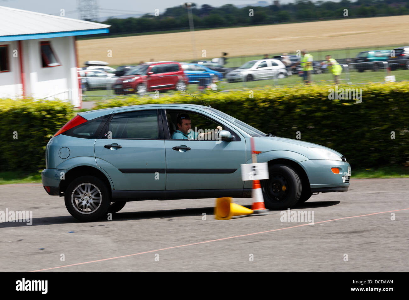 A car taking part in an AutoSolo at Castle Combe Circuit Stock Photo ...