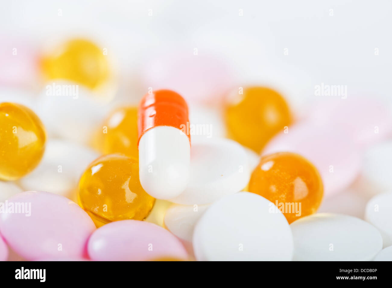 Colorful tablets with capsules Stock Photo - Alamy