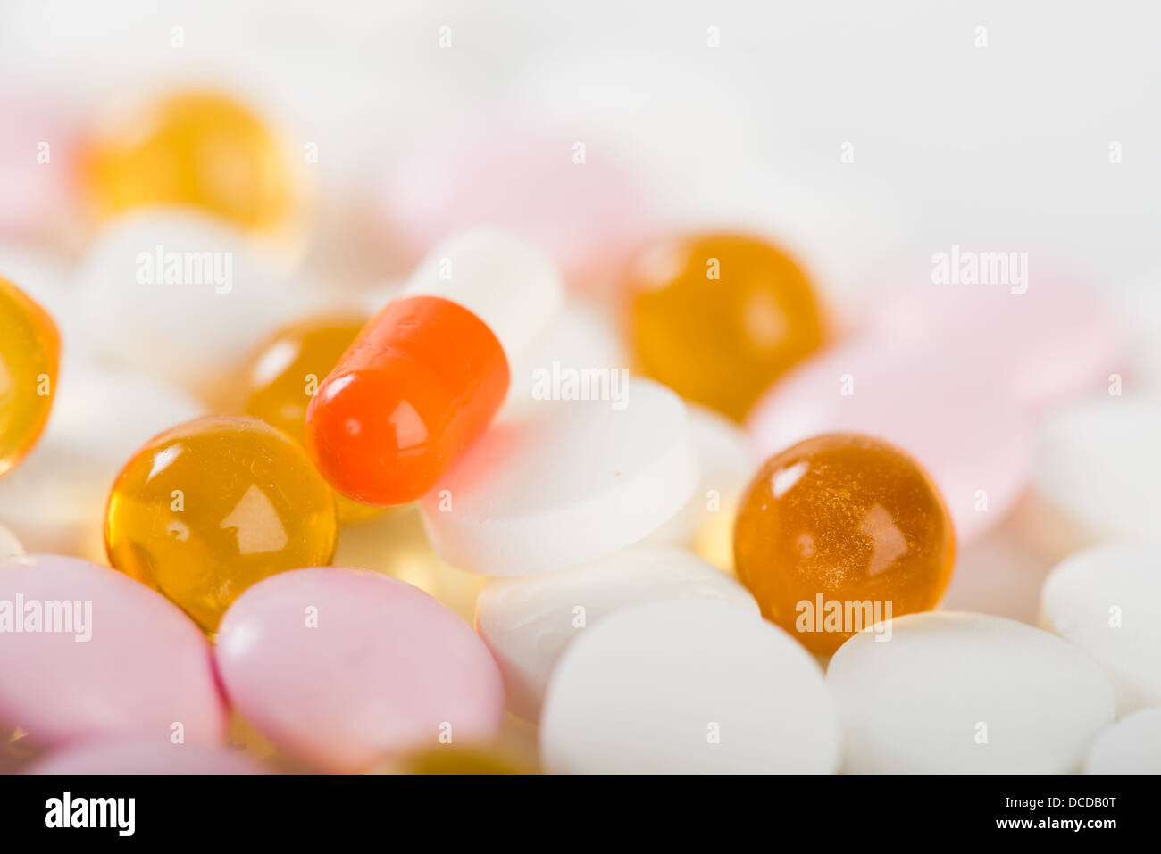 Colorful tablets with capsules Stock Photo - Alamy