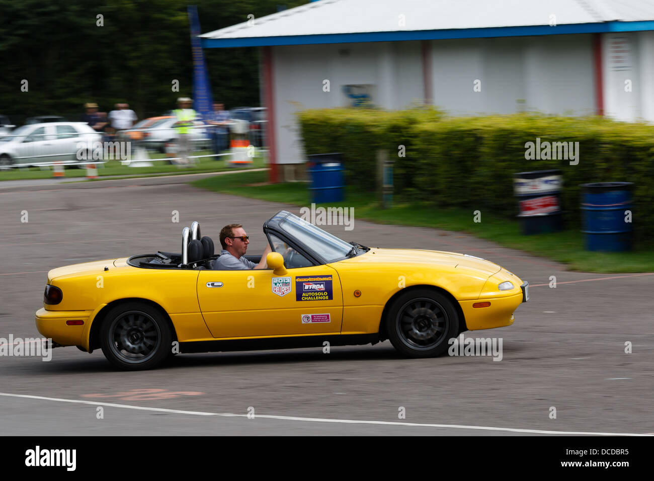 A car taking part in an AutoSolo at Castle Combe Circuit Stock Photo ...