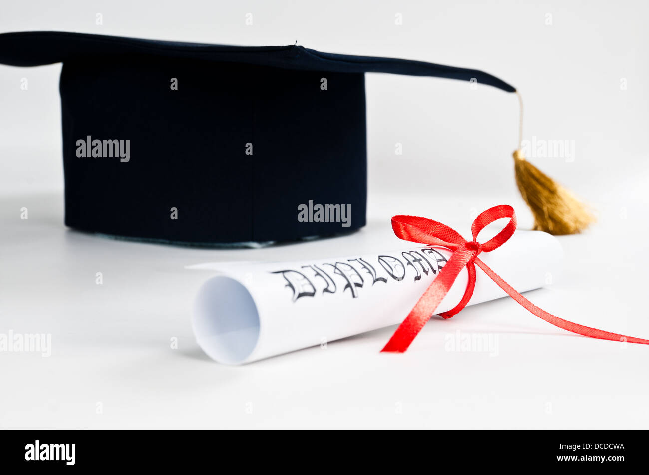 Graduation hat and Diploma Stock Photo - Alamy