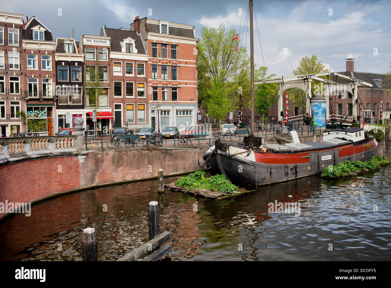 Picturesque Amstel river waterfront in the city of Amsterdam, Holland ...