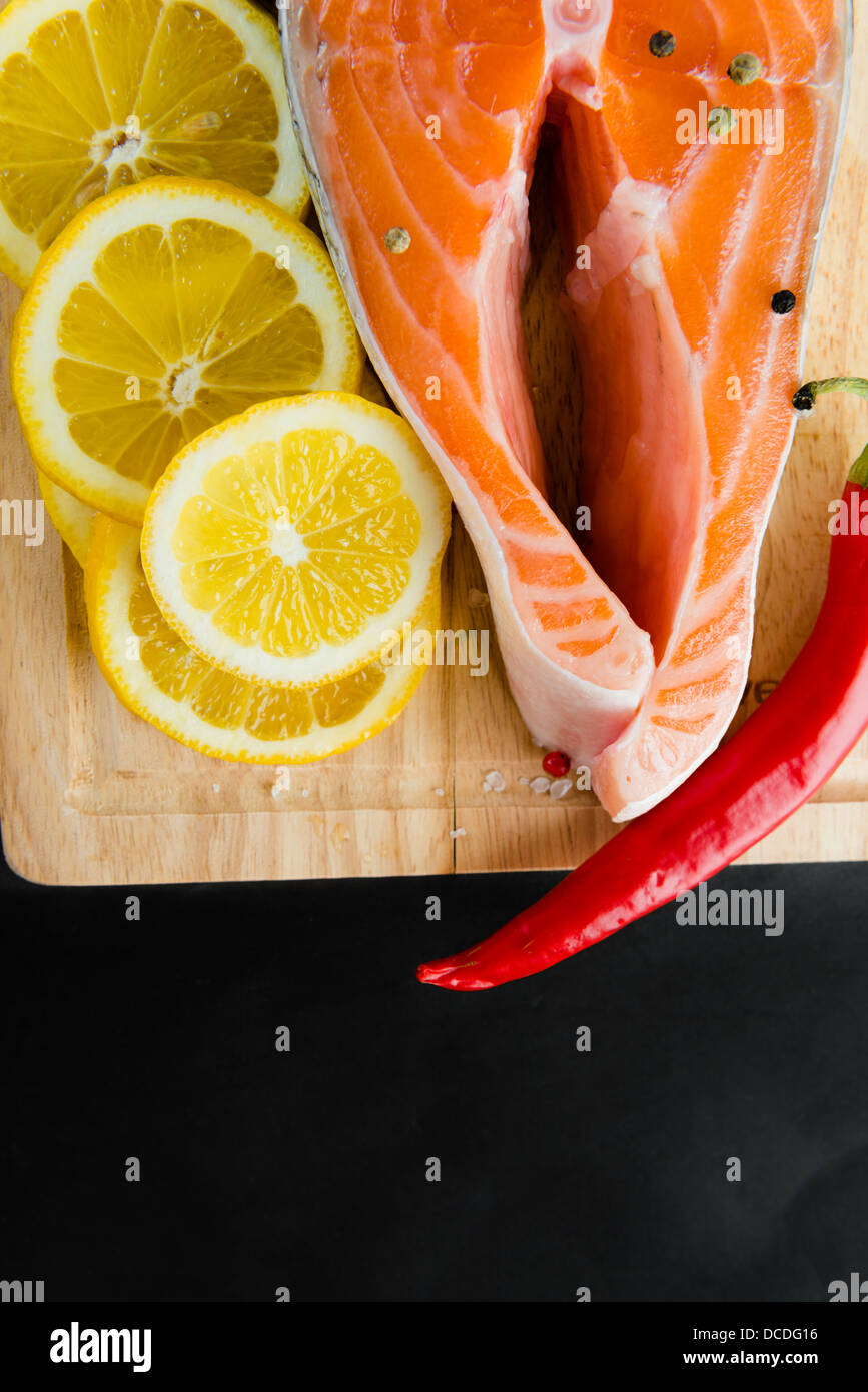 Salmon fillet with lemon Stock Photo - Alamy