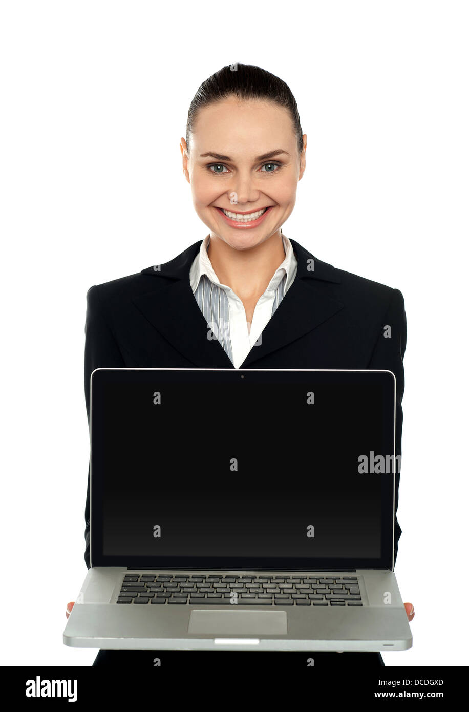 Cheerful female executive presenting brand new laptop to you Stock ...