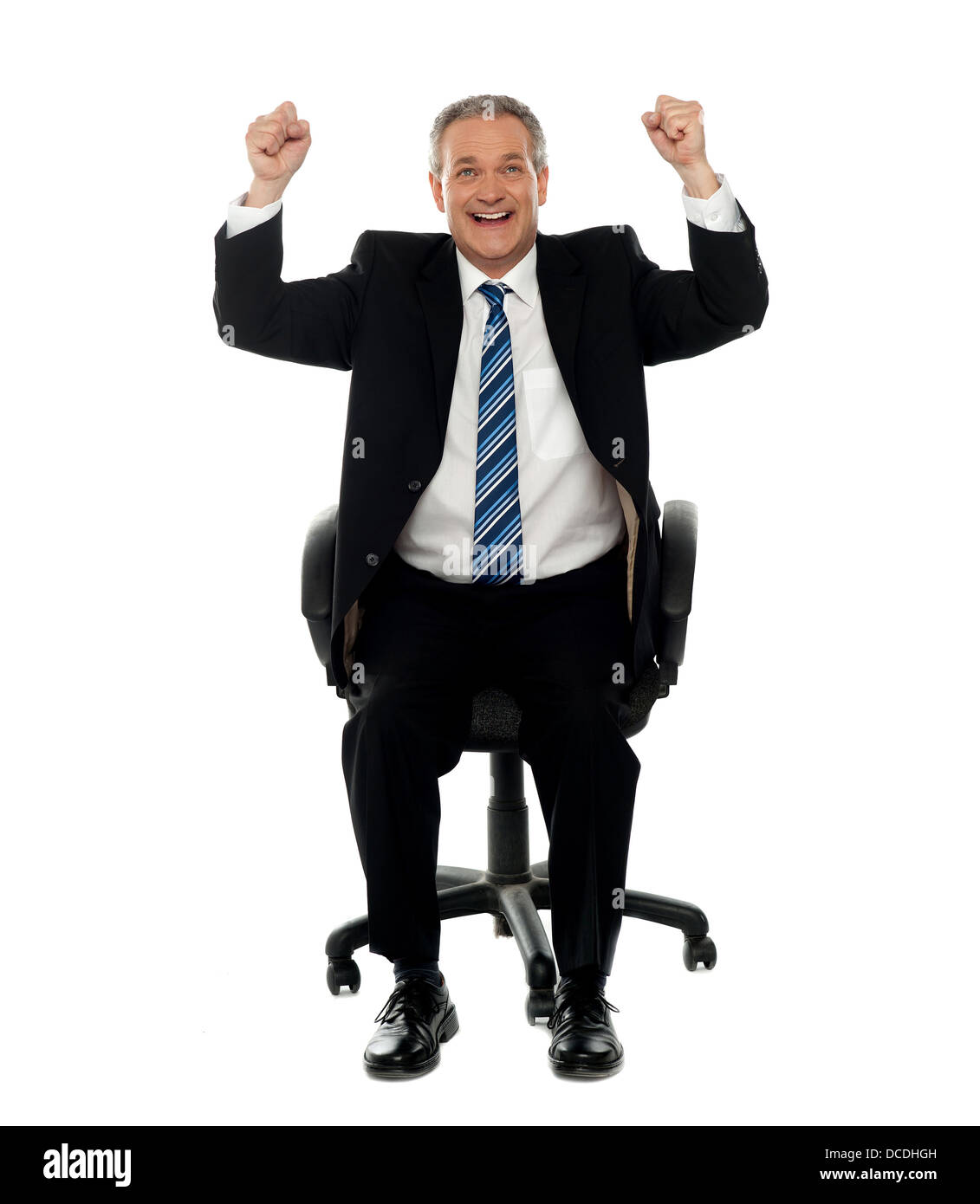 Successful business gesturing happiness, seated on chair. All on white ...