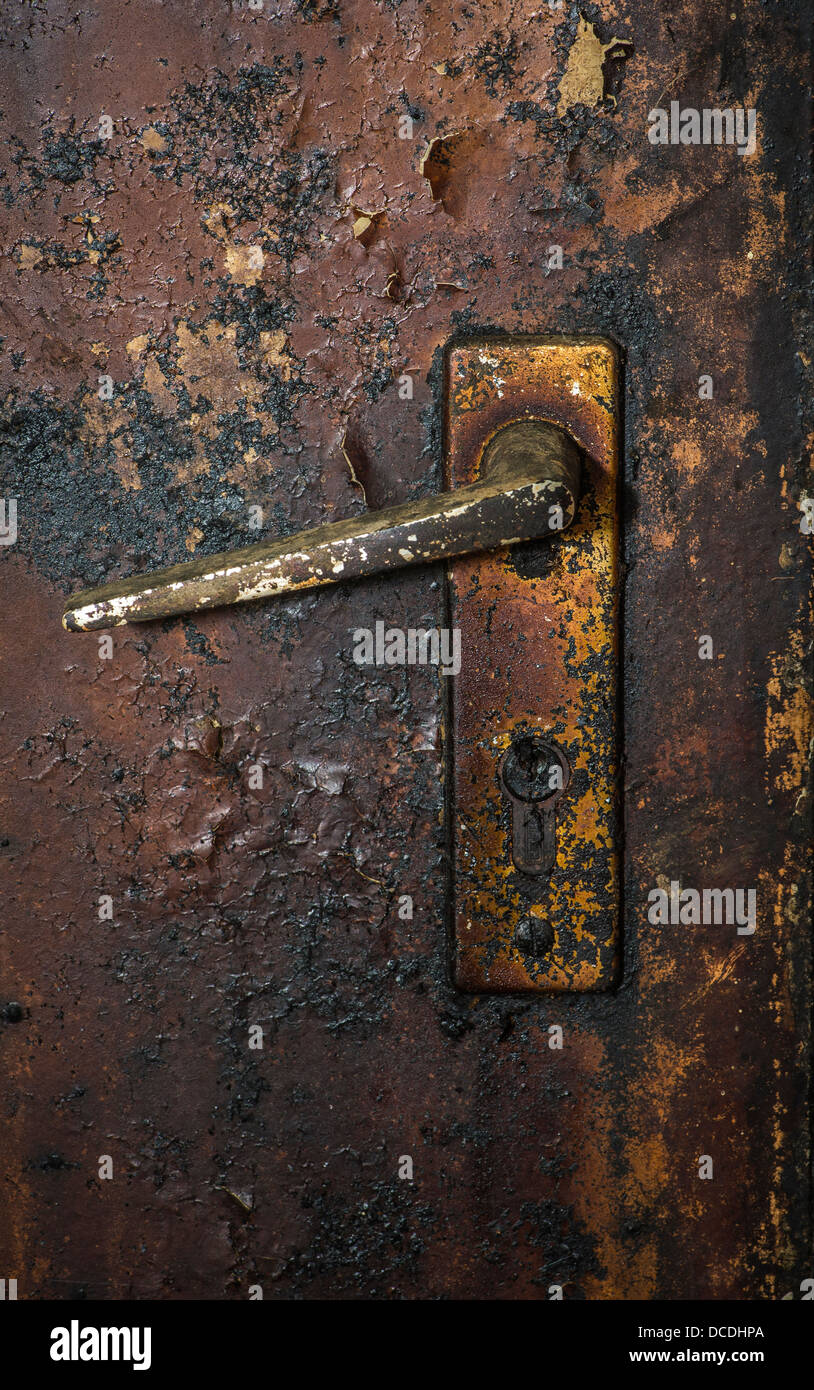 Fire Damaged Door with Handle Stock Photo - Alamy