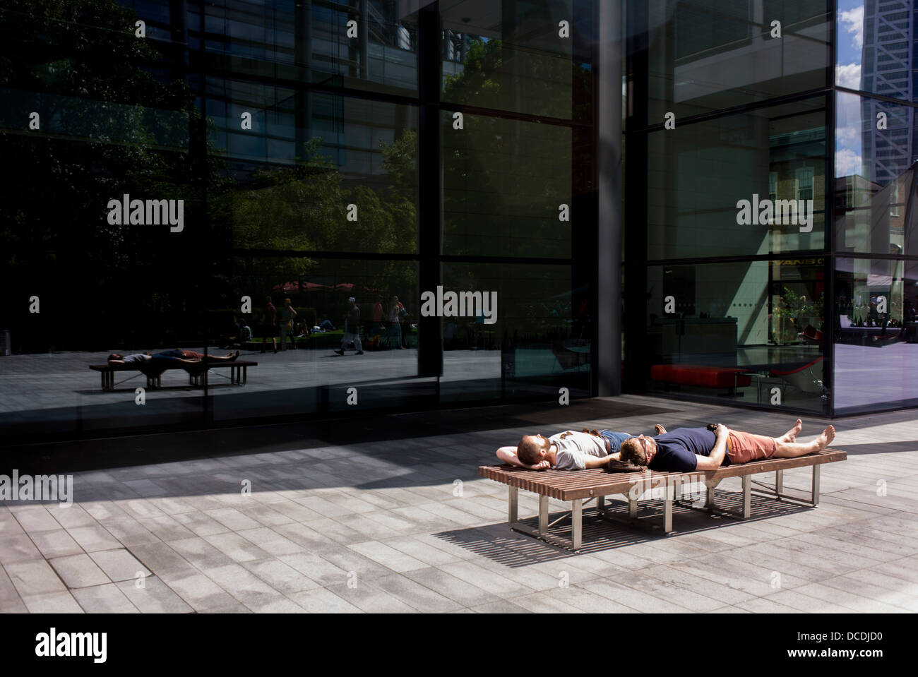 Two men sleeping on bench hi-res stock photography and images - Alamy