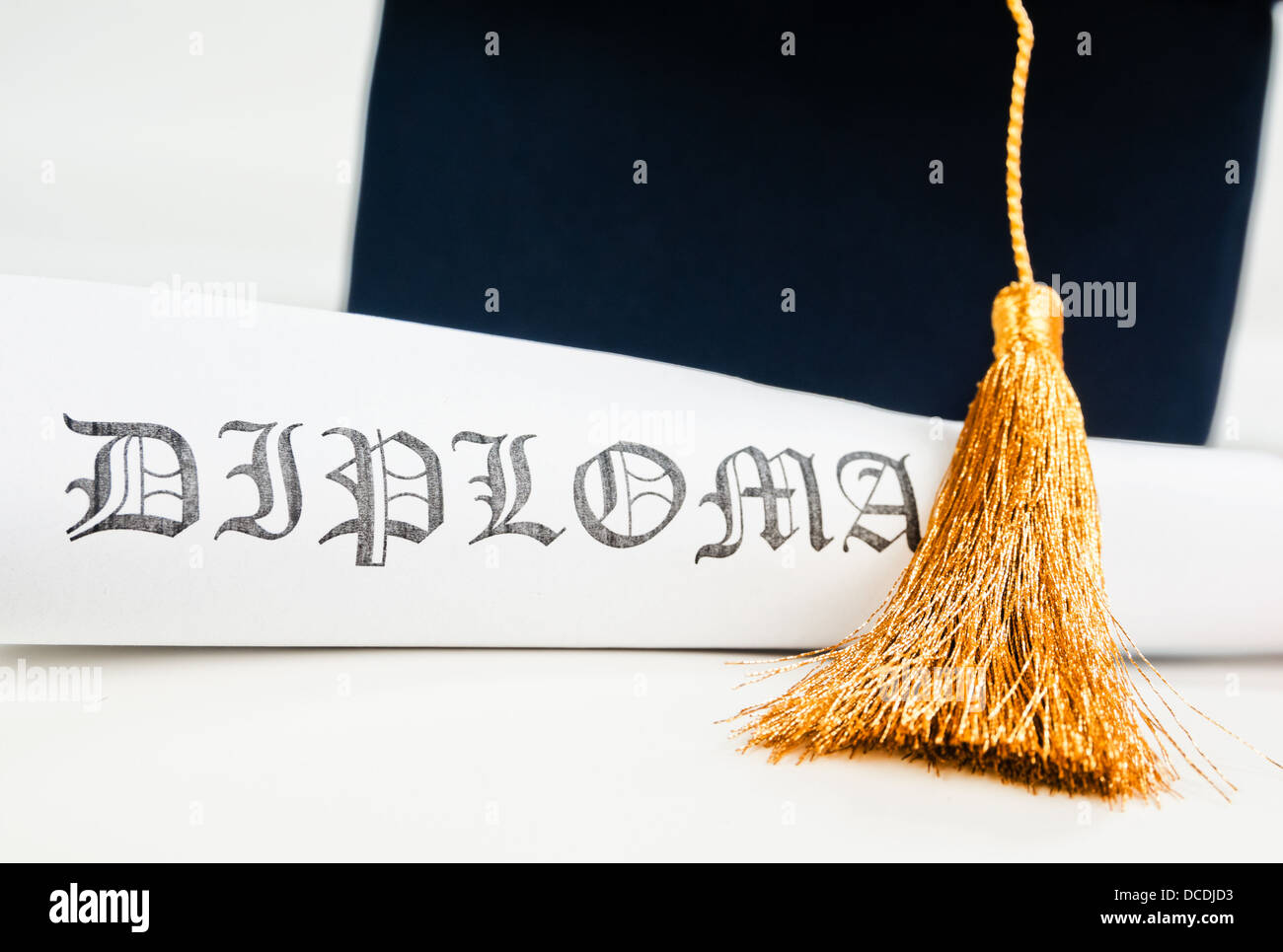 Graduation hat and Diploma Stock Photo - Alamy