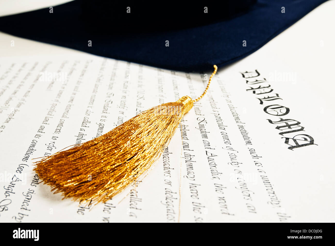 Graduation hat and Diploma Stock Photo - Alamy