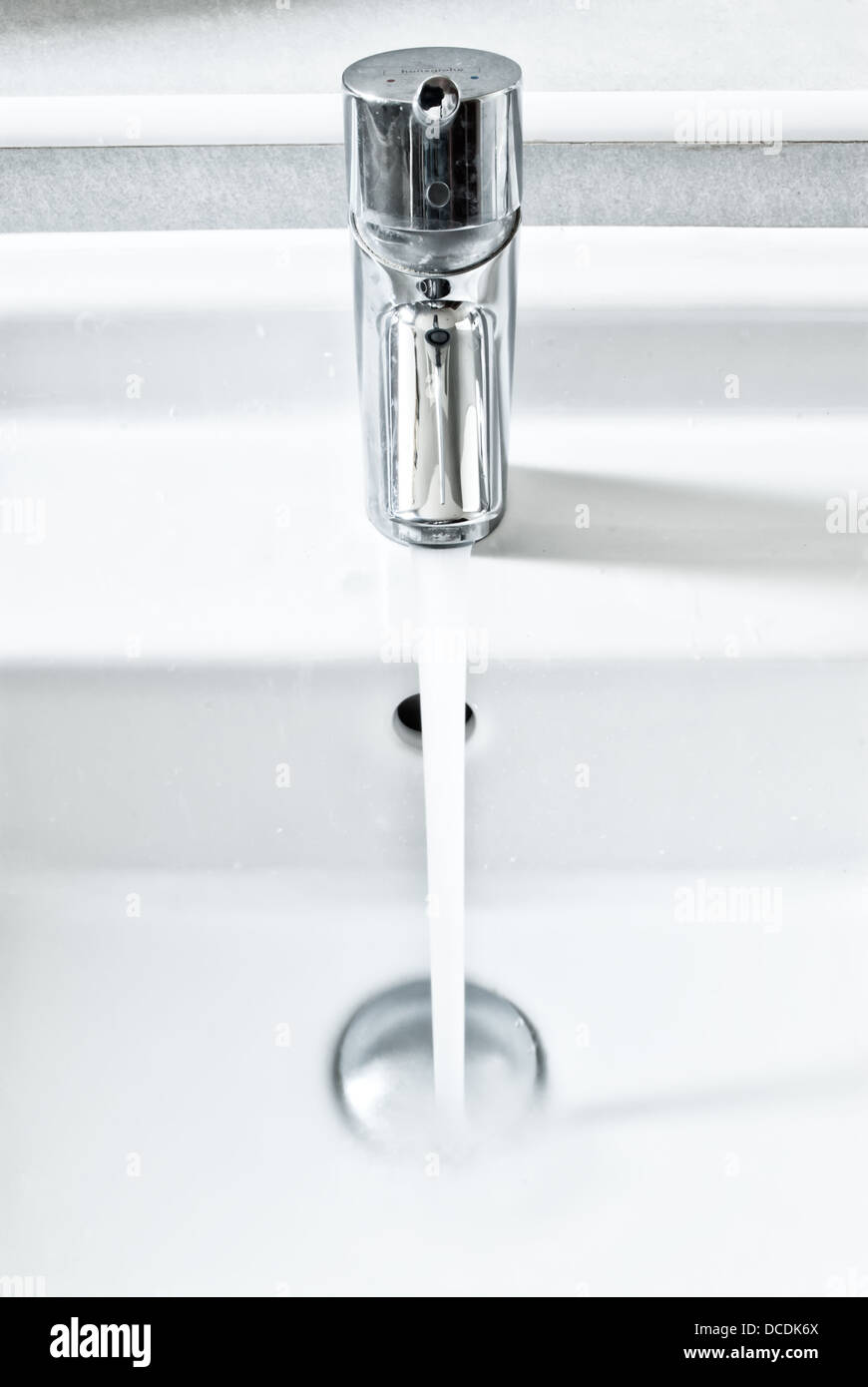 Bathroom tap with water Stock Photo - Alamy