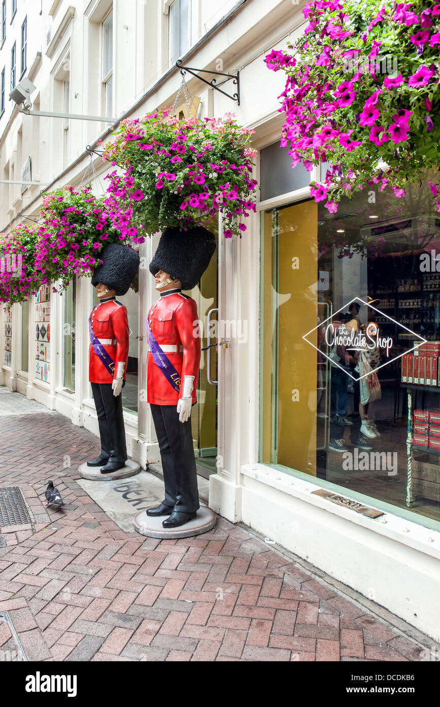 Two foot-guards in bearskins outside the Chocolate shop of Liberty ...