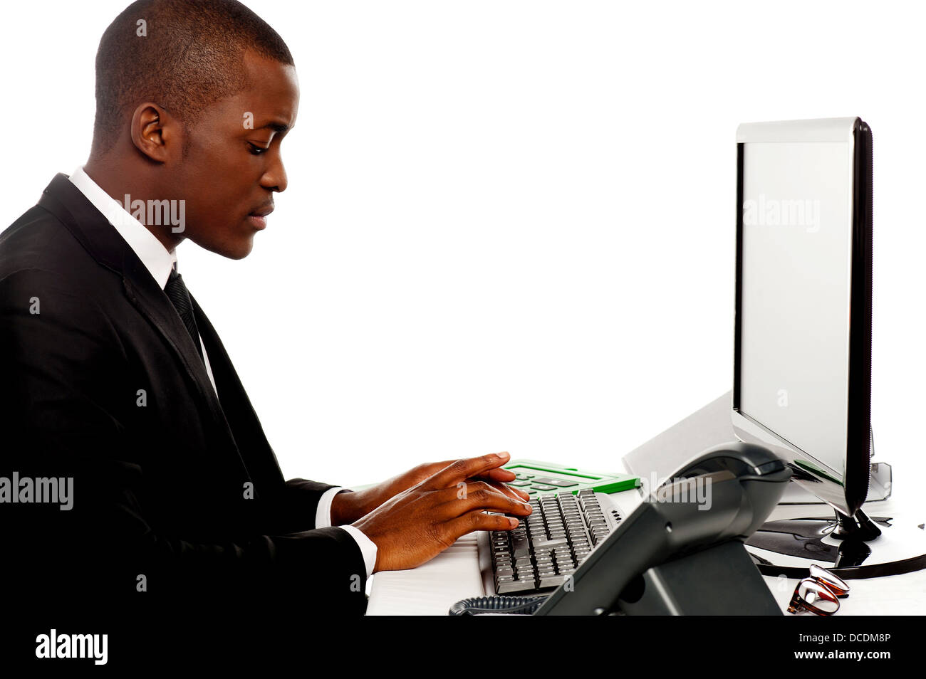 Side view male secretary typing on keyboard working on computer Stock ...