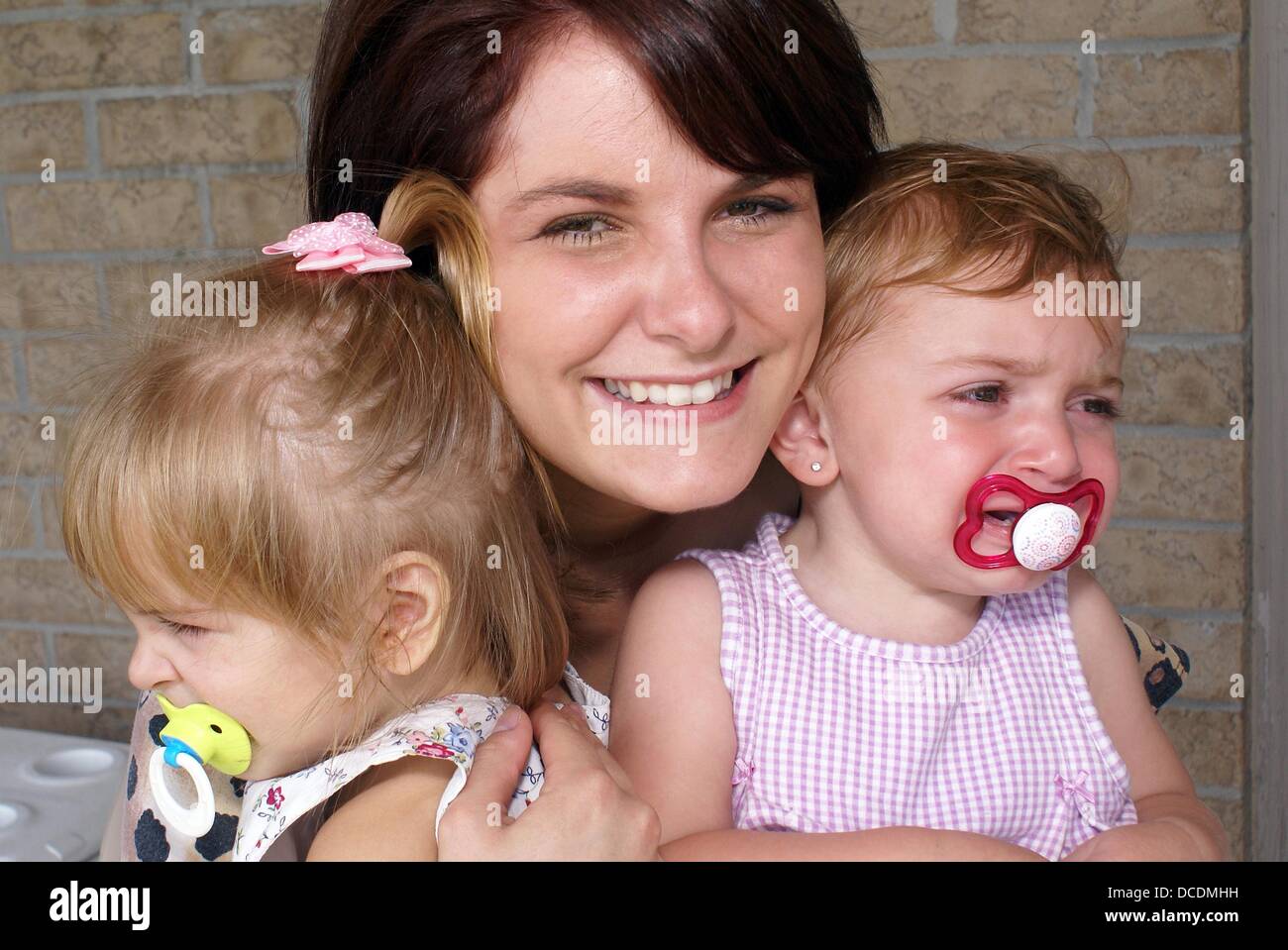 Young lady and pacifier hi-res stock photography and images - Alamy