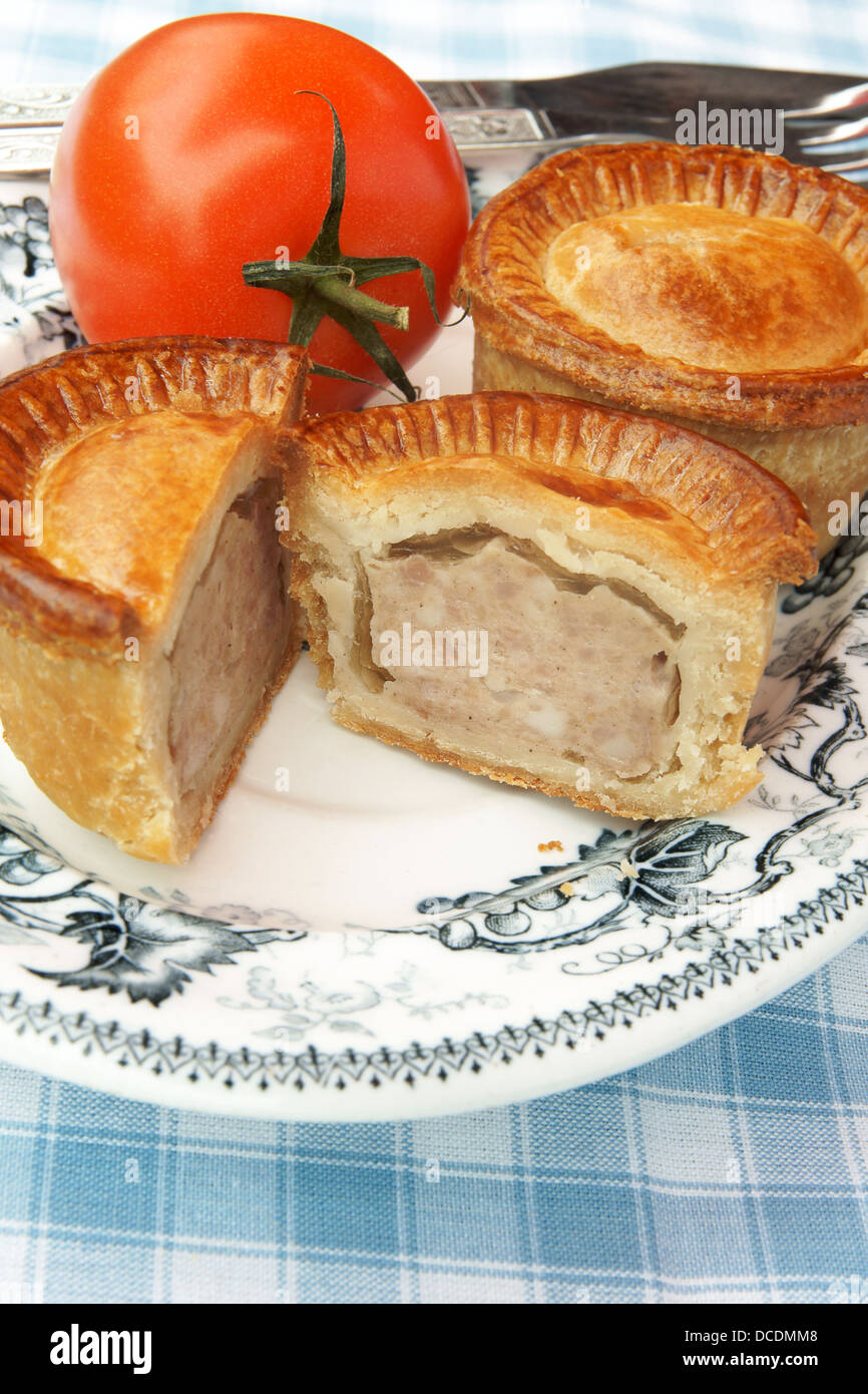Pork pies in a picnic setting Stock Photo - Alamy