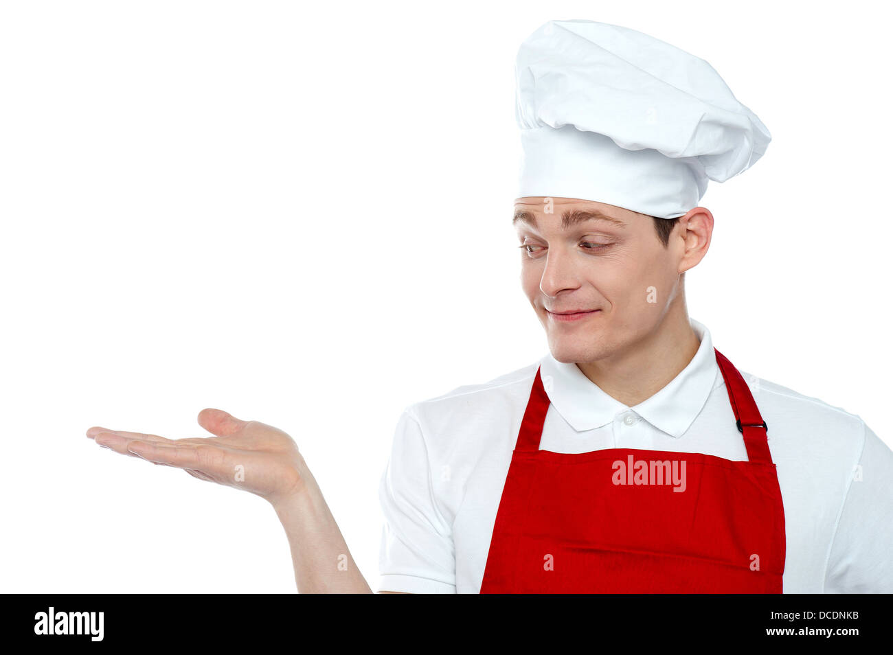 Chef looking at his hand. Offering cooked food. All on white background ...