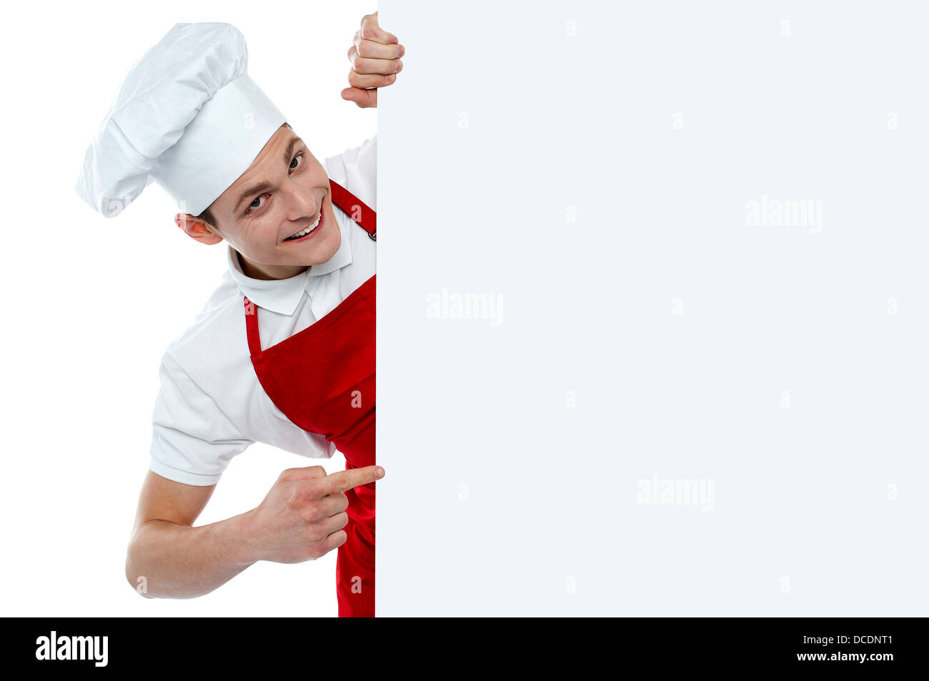 Male chef indicating at blank menu isolated over white background Stock ...