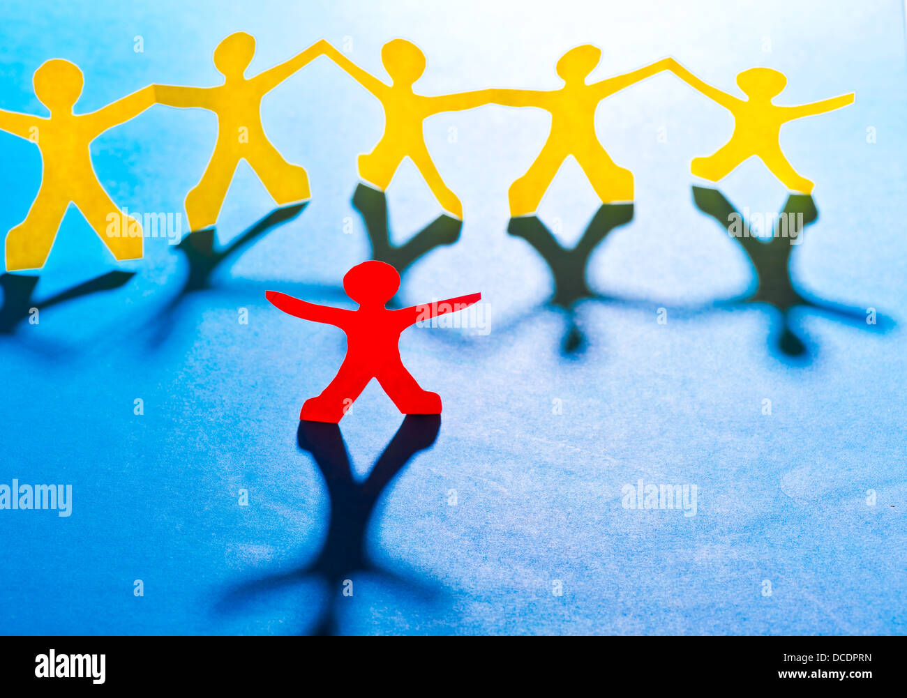 Paper people in teamworking concept Stock Photo - Alamy