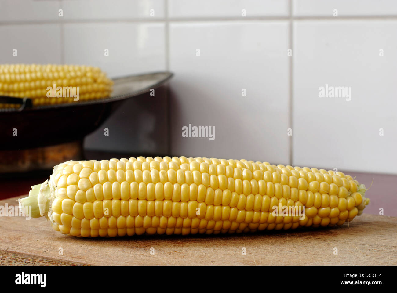 Sweetcorn on a table Stock Photo - Alamy