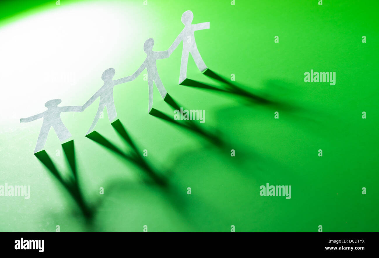 Paper people in teamworking concept Stock Photo - Alamy