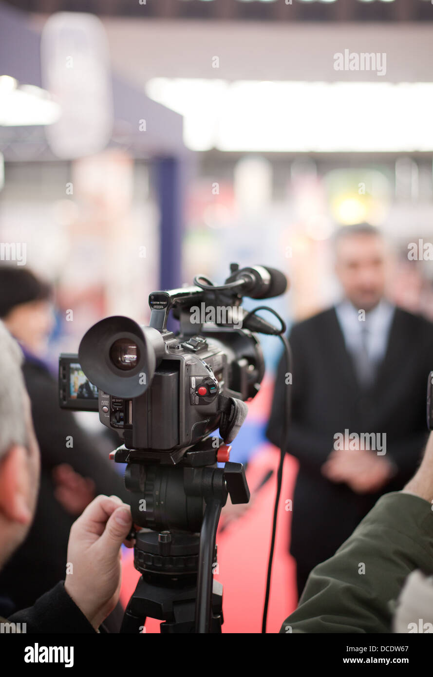 capturing event with professional video camera Stock Photo - Alamy