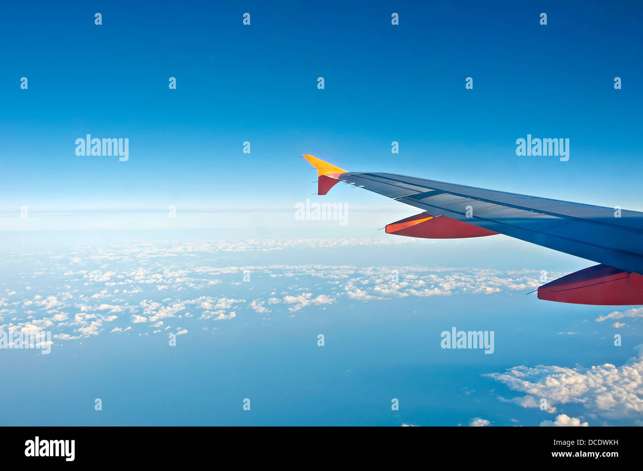 View of aeroplane flying in blue sky hi-res stock photography and ...