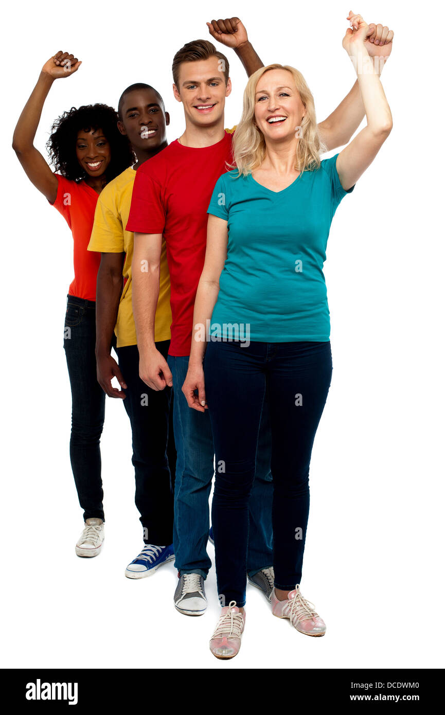 Excited group of cheerful people, full length shot over white ...