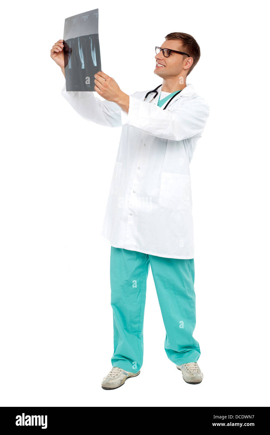 Handsome surgeon looking on patient,full length portrait Stock Photo ...