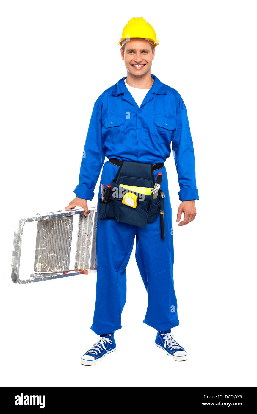 Full length portrait of happy young construction worker ready for work ...