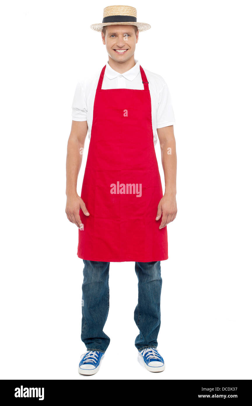 Chef with a hat isolated against white background. Full length portrait ...