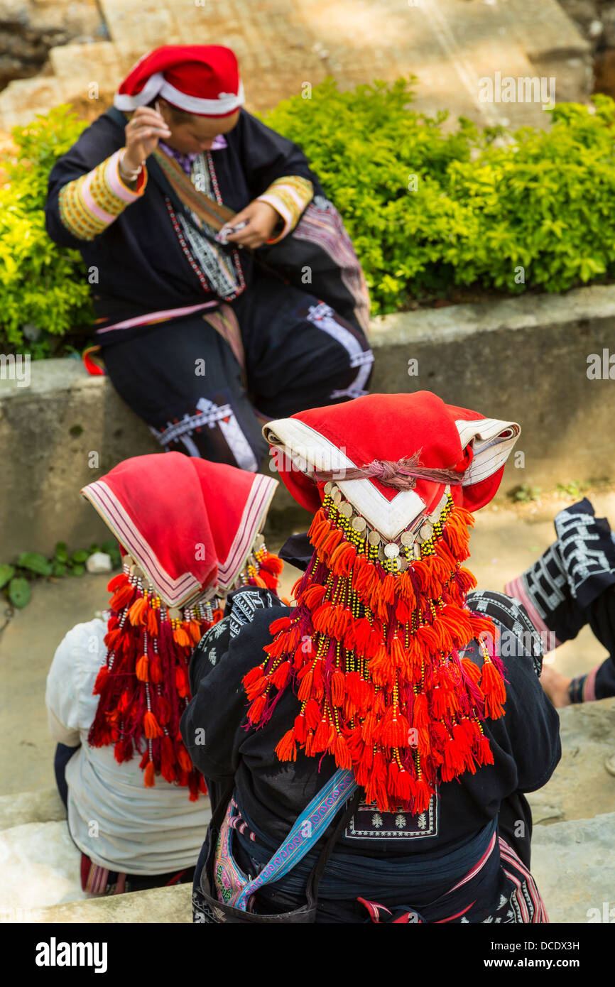 The Red Dao women and their ethnic head dress in the village square in ...