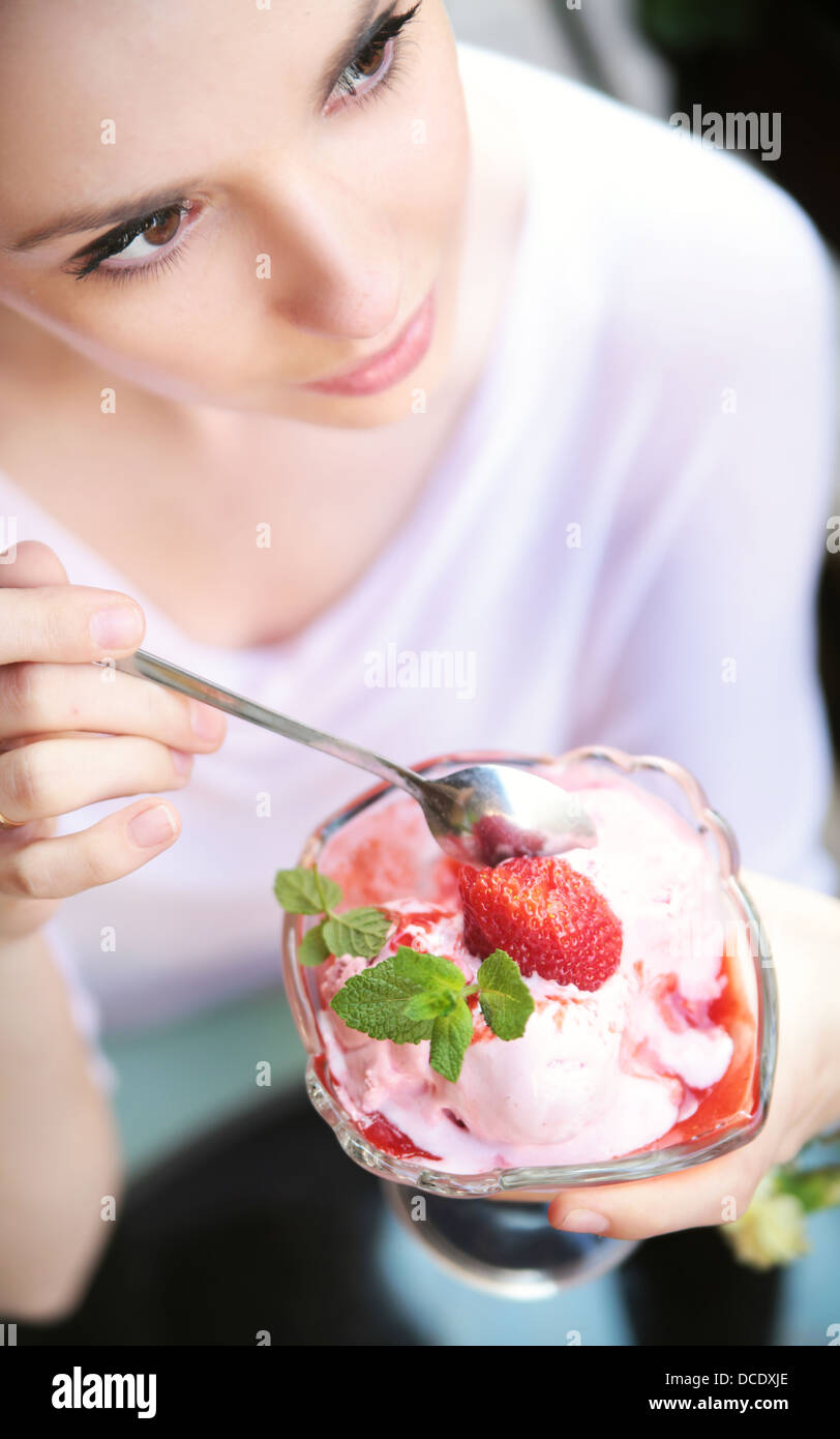 Delicate alluring lady with fresh dessert Stock Photo - Alamy