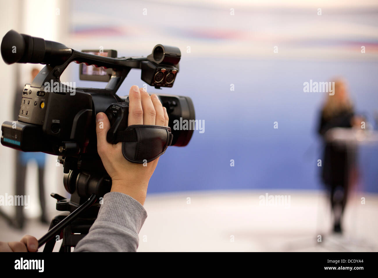 capturing event with professional video camera Stock Photo - Alamy