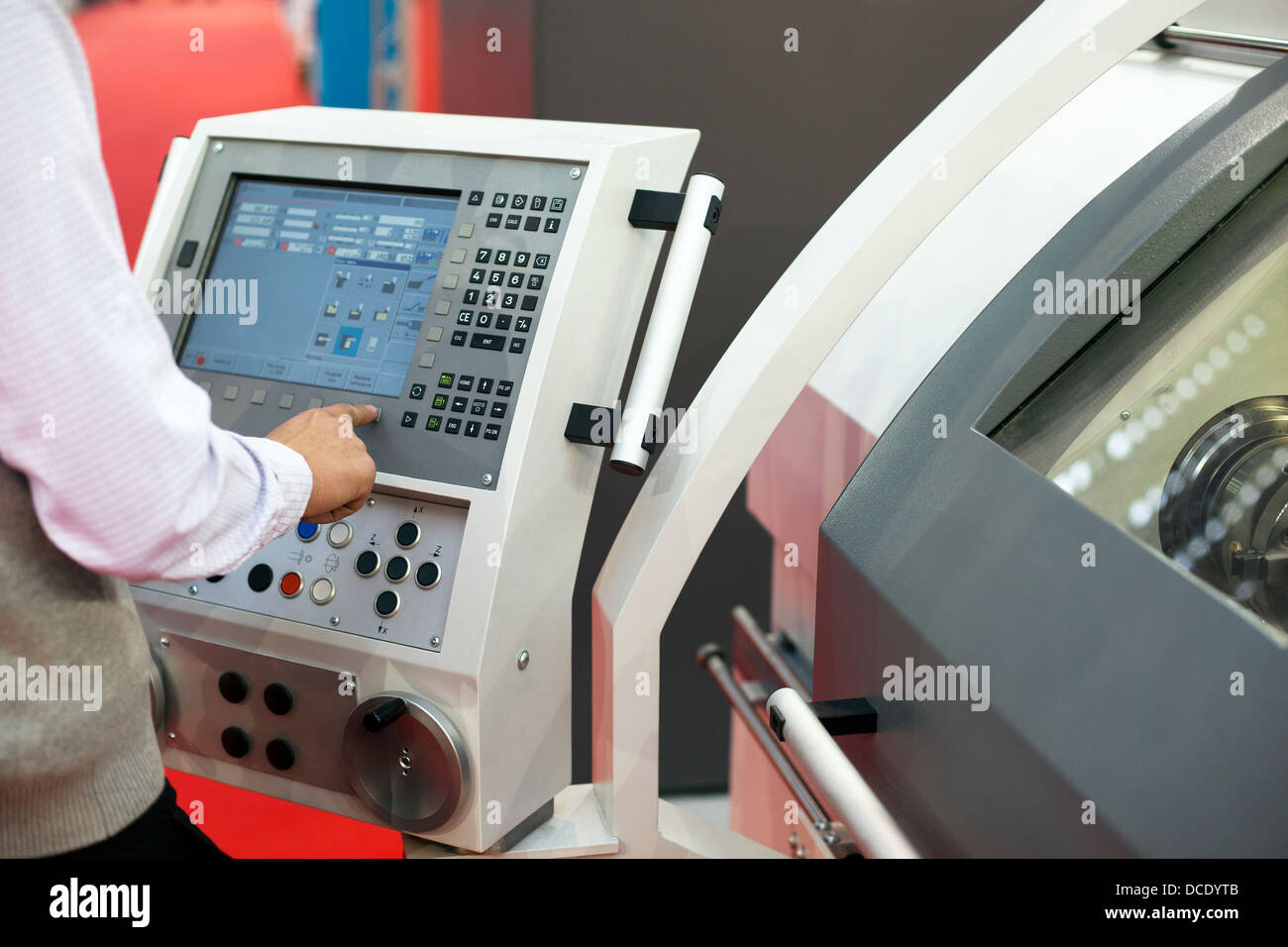 man working at programmable machine Stock Photo - Alamy