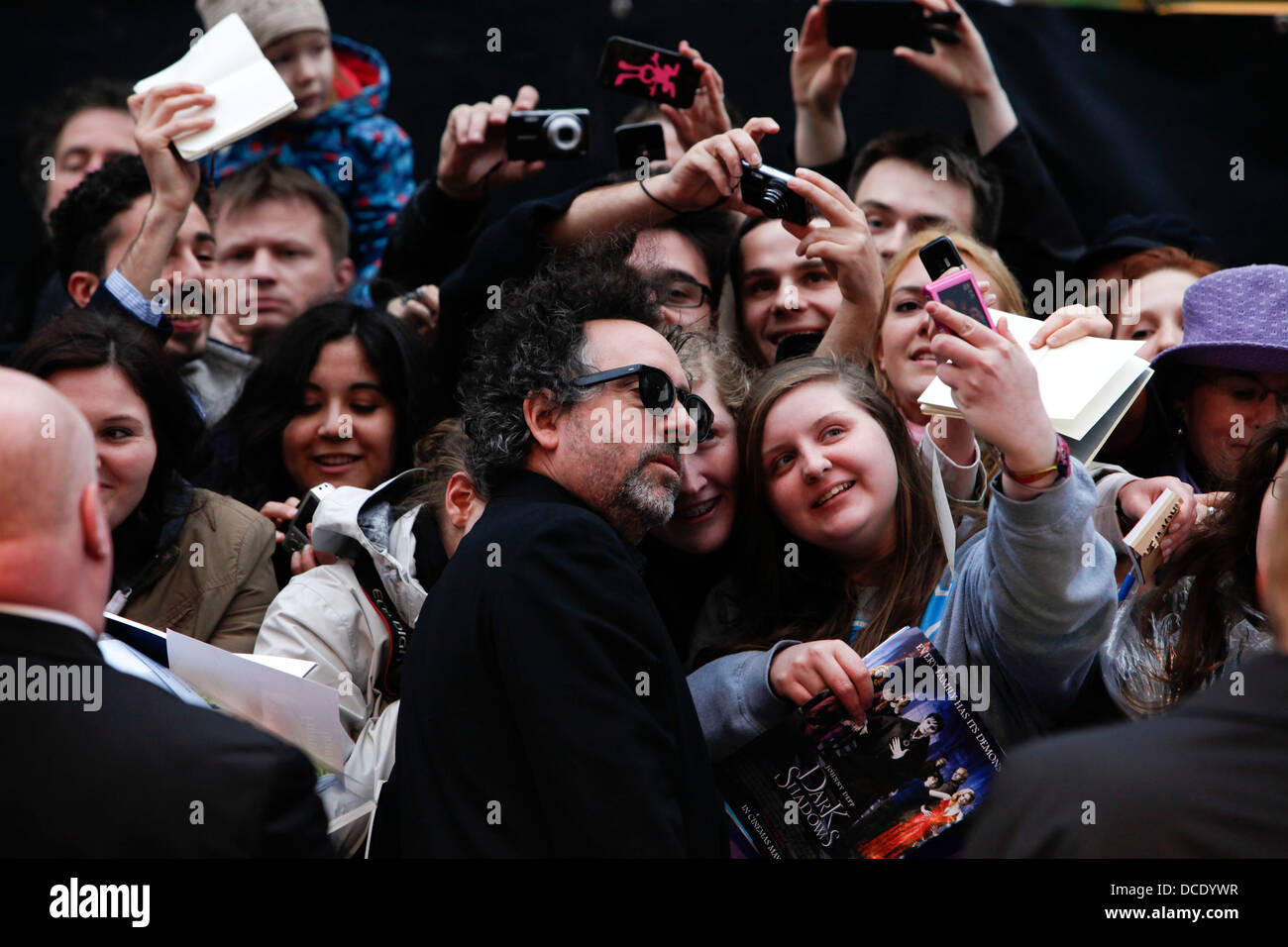 Director Tim Burton arrives on the red carpet to attend the UK premiere ...