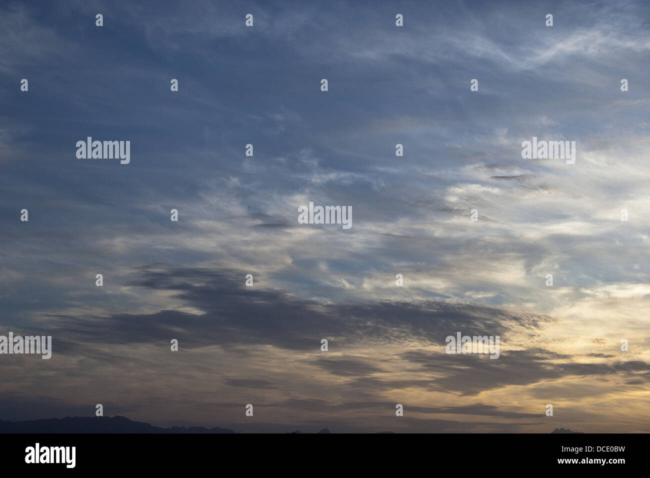 Colourful sunset sky clouds at the evening Stock Photo - Alamy