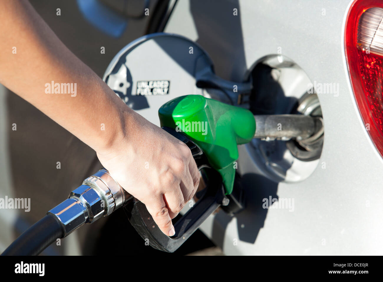 refueling vehicle at gas station Stock Photo - Alamy