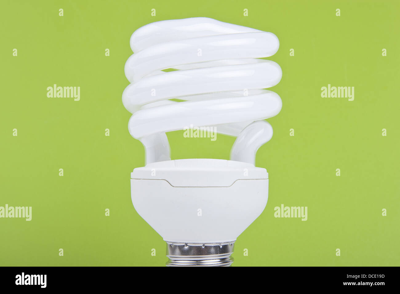 bulb on green background Stock Photo - Alamy