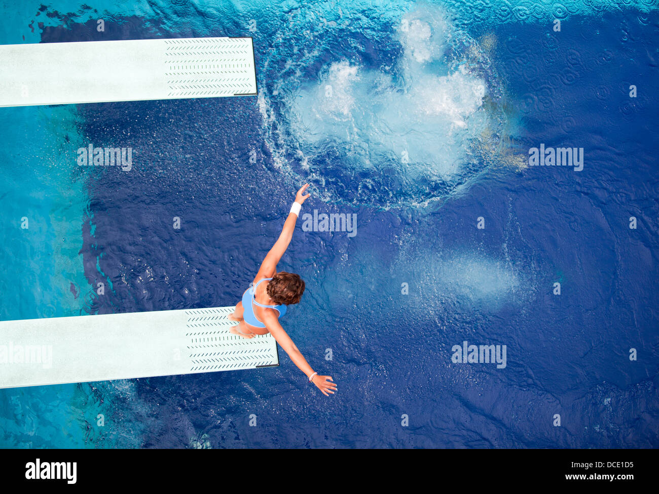springboard jump, girl standing on diving board Stock Photo - Alamy