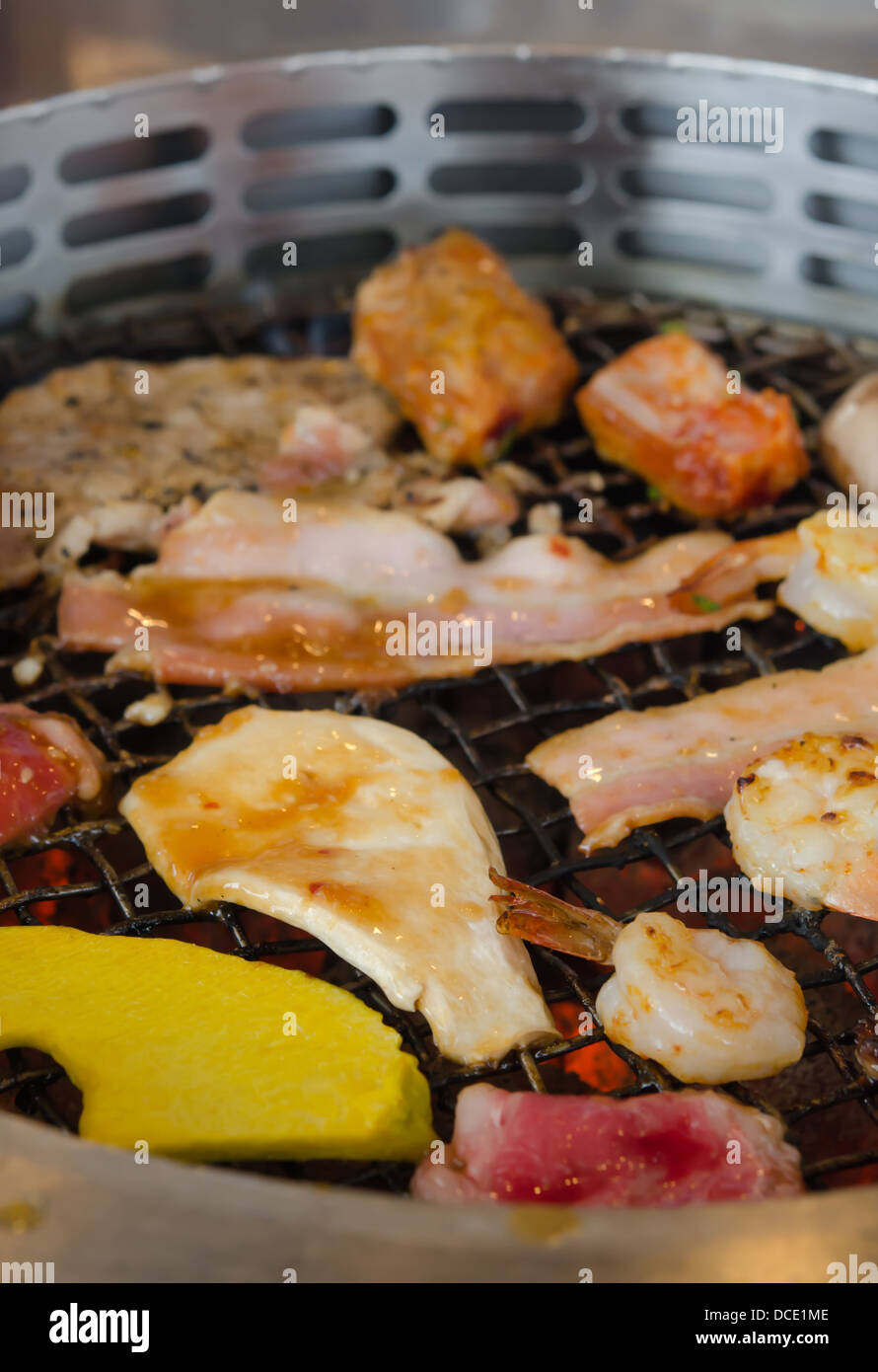 barbecue cooking , grill seafood , meat and vegetable Stock Photo - Alamy
