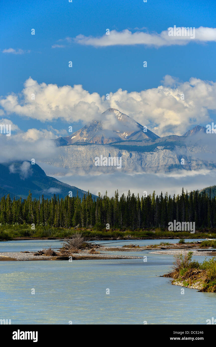 Pyramid mountain towering over the other mountain ridges, with cloud ...